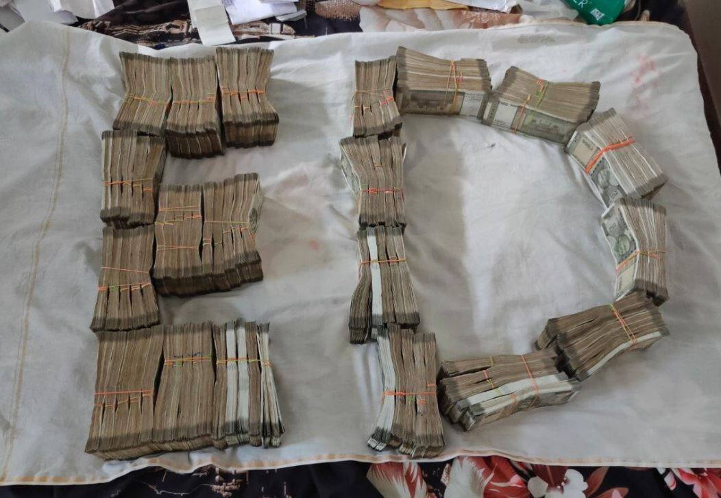 In Photos: ED recovered Rs 4 cr in cash during raids at the premises of ...
