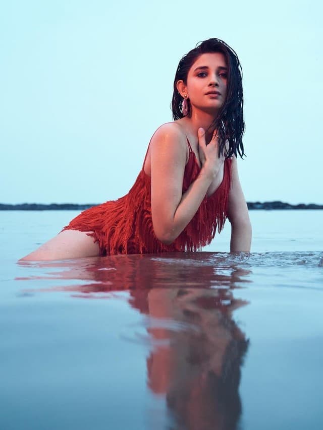 Kanika Mann Sets Fire In Water In A Red Dress
