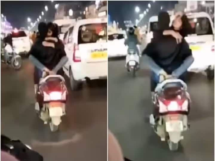 Watch: Lucknow couple romance on scooty video goes viral | Viral Video: રોડ પર દોડતી સ્કૂટી પર ...