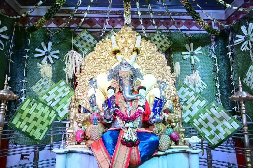 maharashtra news nashik news chandicha Ganesha garlanded with coconut ...