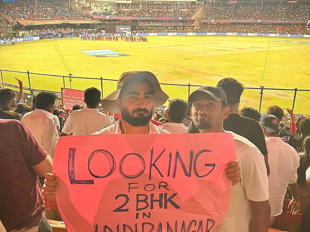 IPL 2023 Viral Picture Man Poses With Placard For 2 BHK In Indiranagar ...