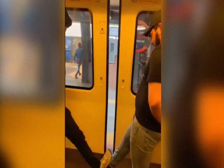 Delhi Metro Train Video Of Men Stopping Train Door From Closing Goes
