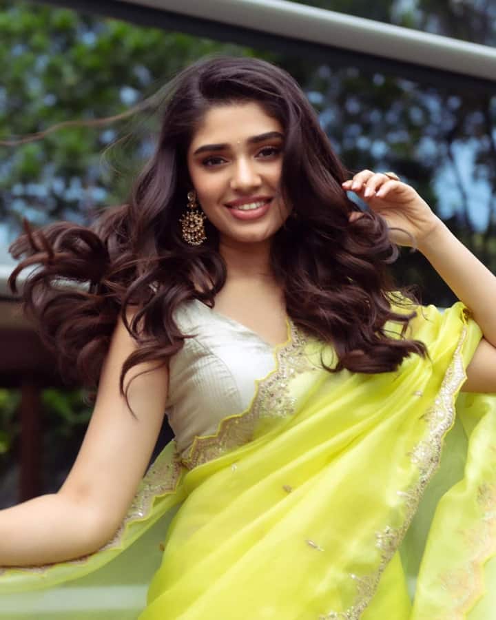 Krithi Shetty Poses In A Lemon Yellow Saree