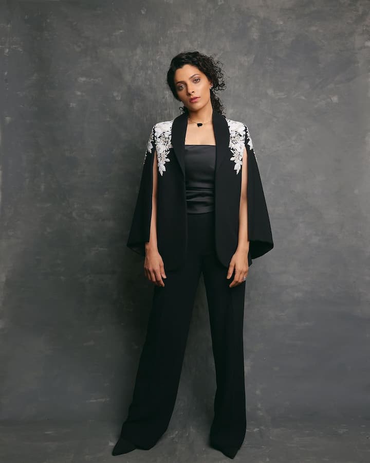 Saiyami Kher Poses In An Orange Pantsuit