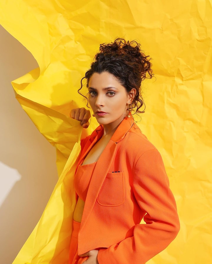 Saiyami Kher Poses In An Orange Pantsuit