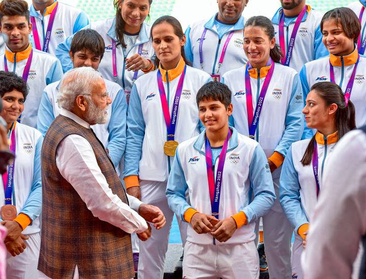 PM Narendra Modi meets with Asian Games medal winners at Delhi look ...