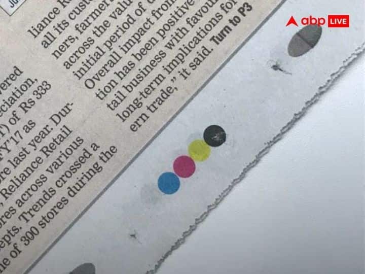 bottom of every page of the newspaper There are blue and red dots do ...