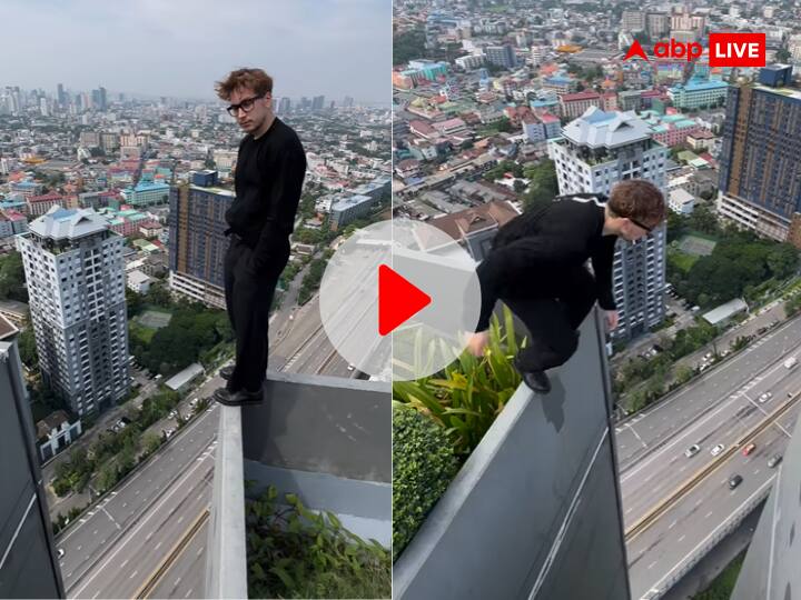Viral Video Man Risk His Life By Standing On Tall Building Railing ...