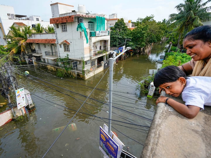 Cyclone Michaung Aftermath Locals Wade Through Waterlogged Streets In Chennai SEE PICS