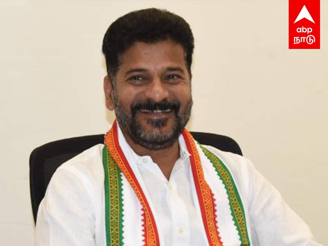 Revanth Reddy's first action after swearing ceremony - watch now ...
