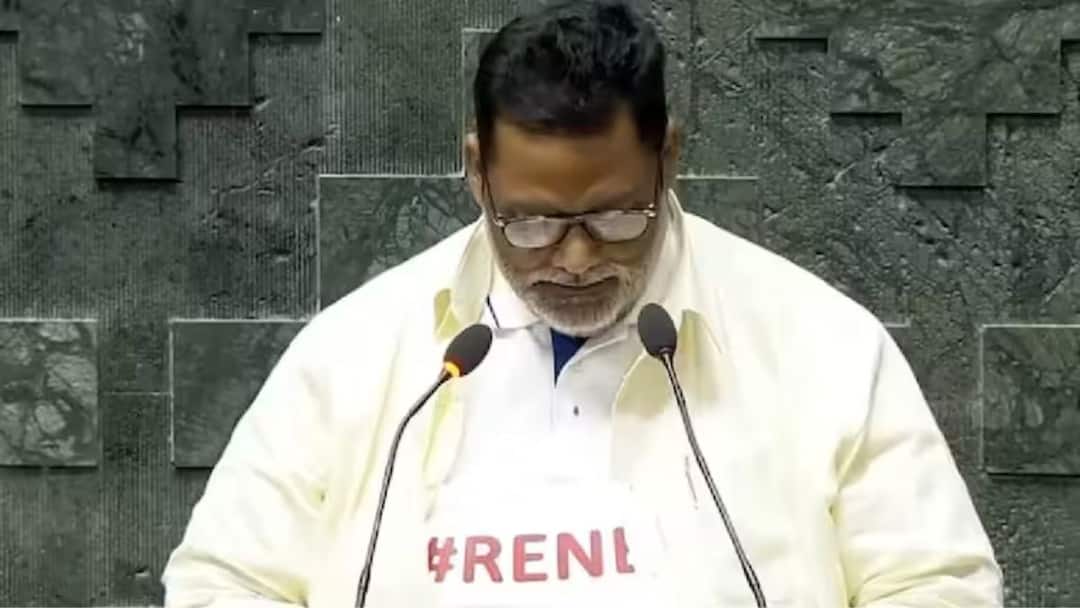 Independent MP Pappu Yadav wears a t shirt with the words ReNEET on it as he takes oath as a ...