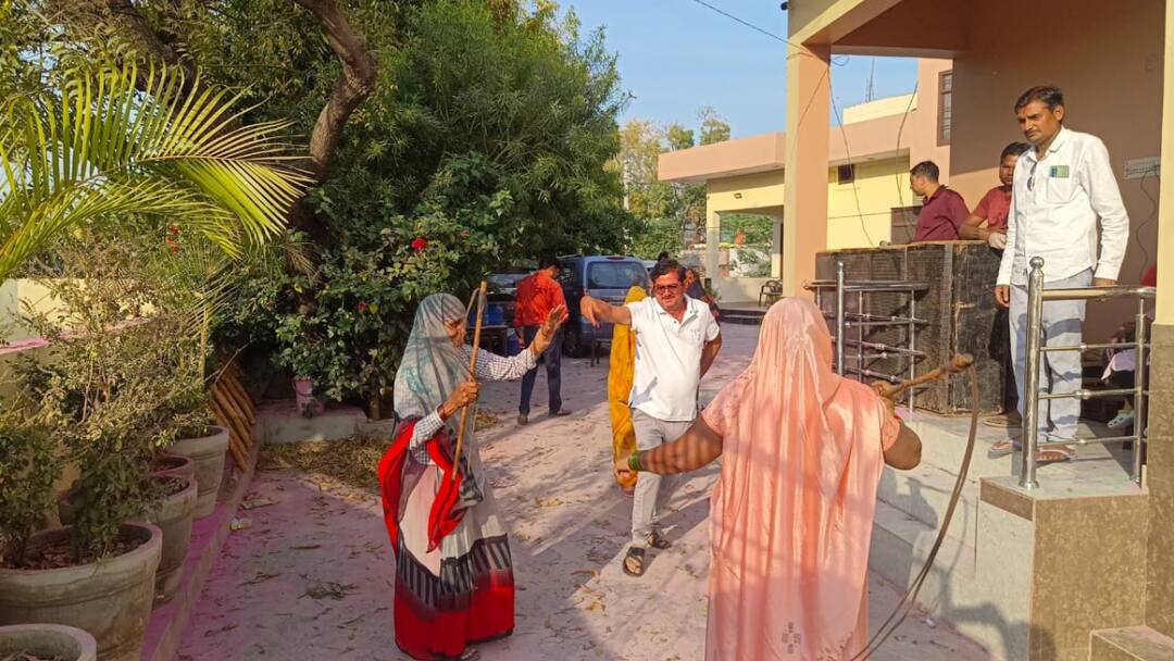 Lathmar Holi in Braj just like women in Firozabad beat men with sticks ...