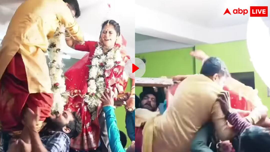 During varmala ceremony bride and groom fell to the ground from the shoulders of their friends ...